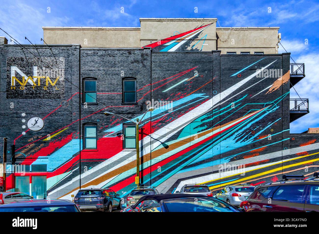 Abstract artwork on side of Nativ Hotel on the corner of Waze St and ...