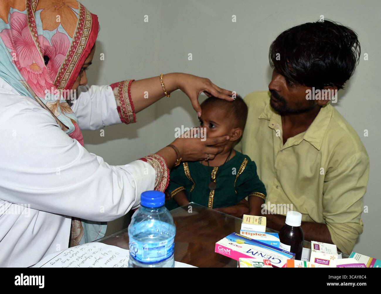 HYDERABAD, PAKISTAN, AUG 07: Patients are being examined by doctors ...