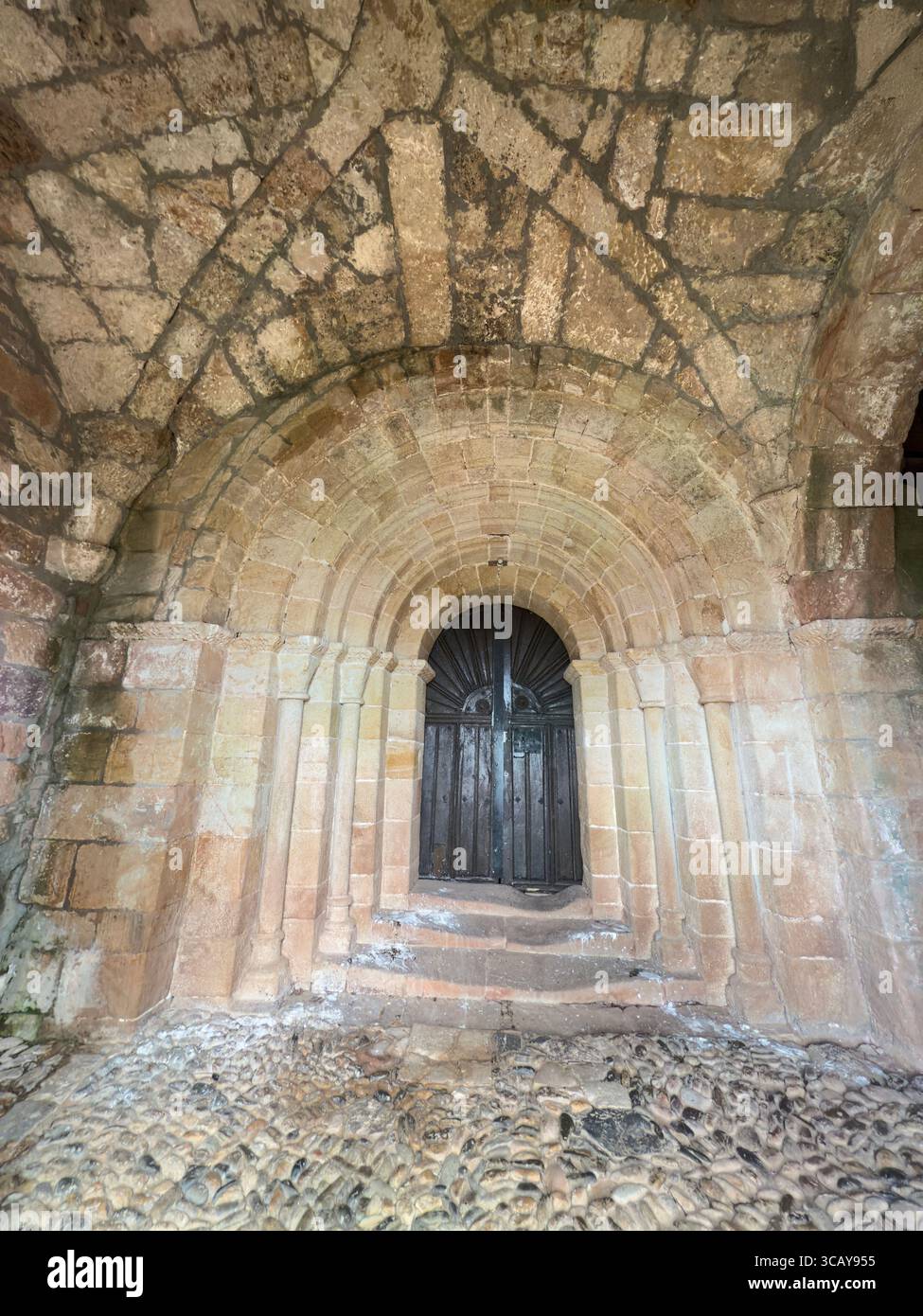 Romanesque entrance of San Juan Bautista Church in Pomar de Valdivia ...