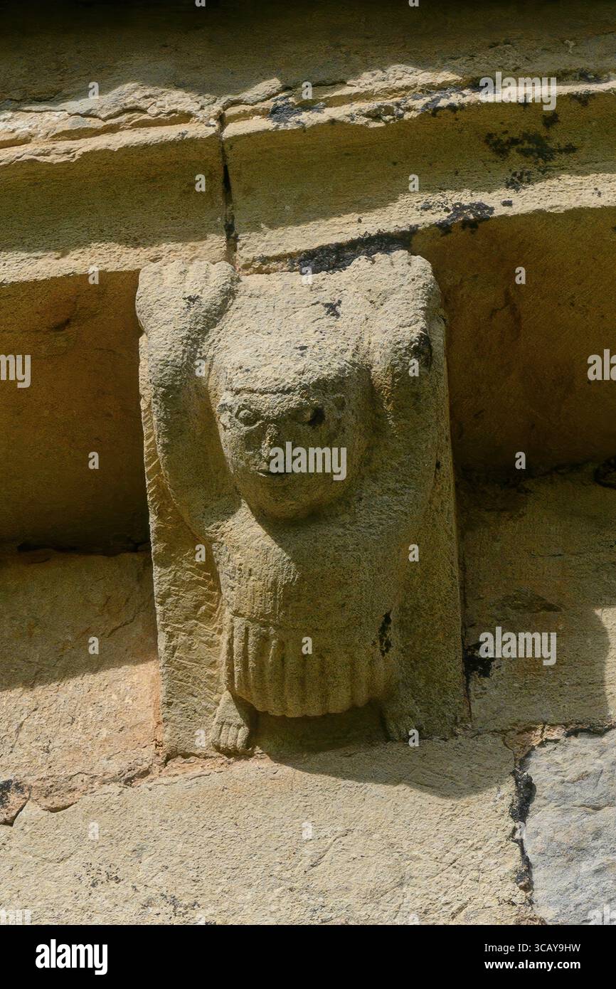 Detailed stone corbel depicting a human figure at Iglesia Ntra Sra de ...