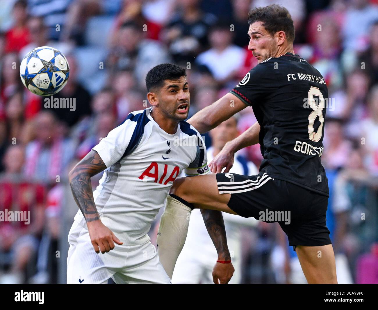 Tottenham Hotspur's Cristian Romero (left) and Bayern Munich's Leon ...
