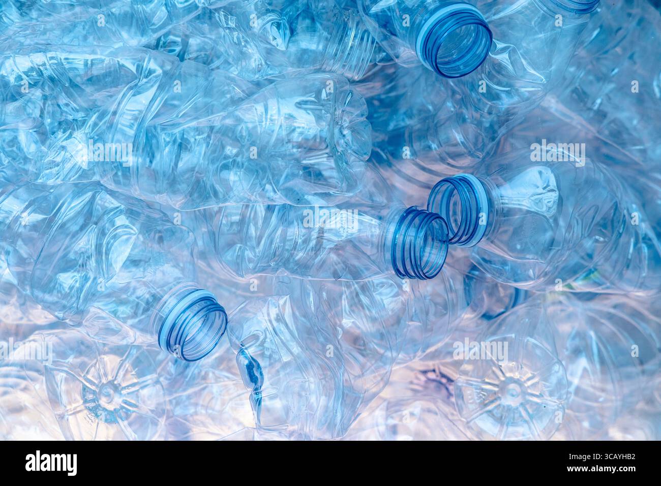 Crushed plastic water bottles Stock Photo - Alamy