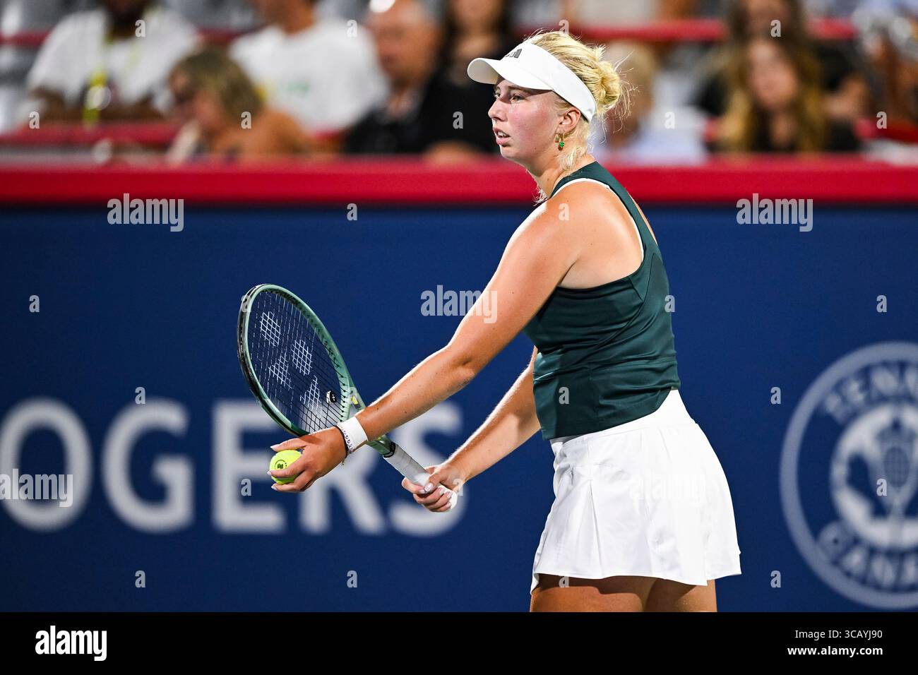 MONTREAL, QC - AUGUST 06: Clara Tauson (DEN) serves the ball during a ...