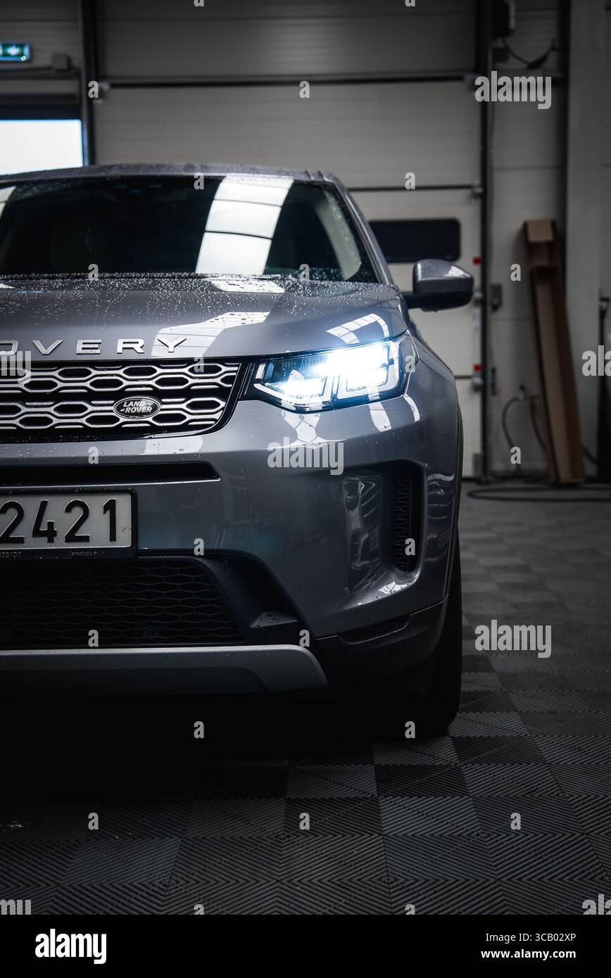 Front View of Silver Range Rover Discovery in Indoor Garage Stock Photo ...