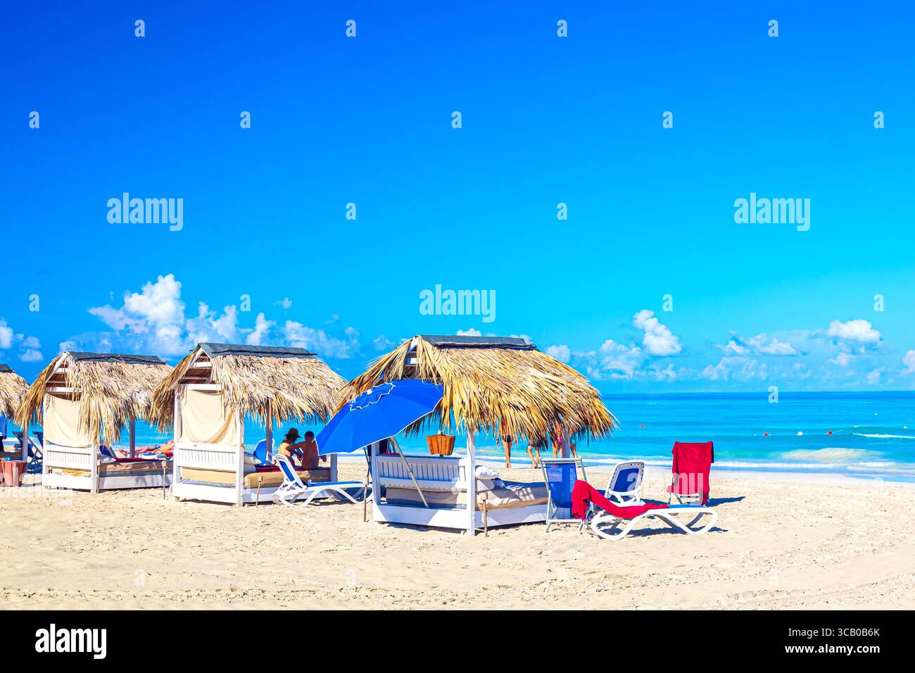 Straw umbrella beds on hi-res stock photography and images - Alamy