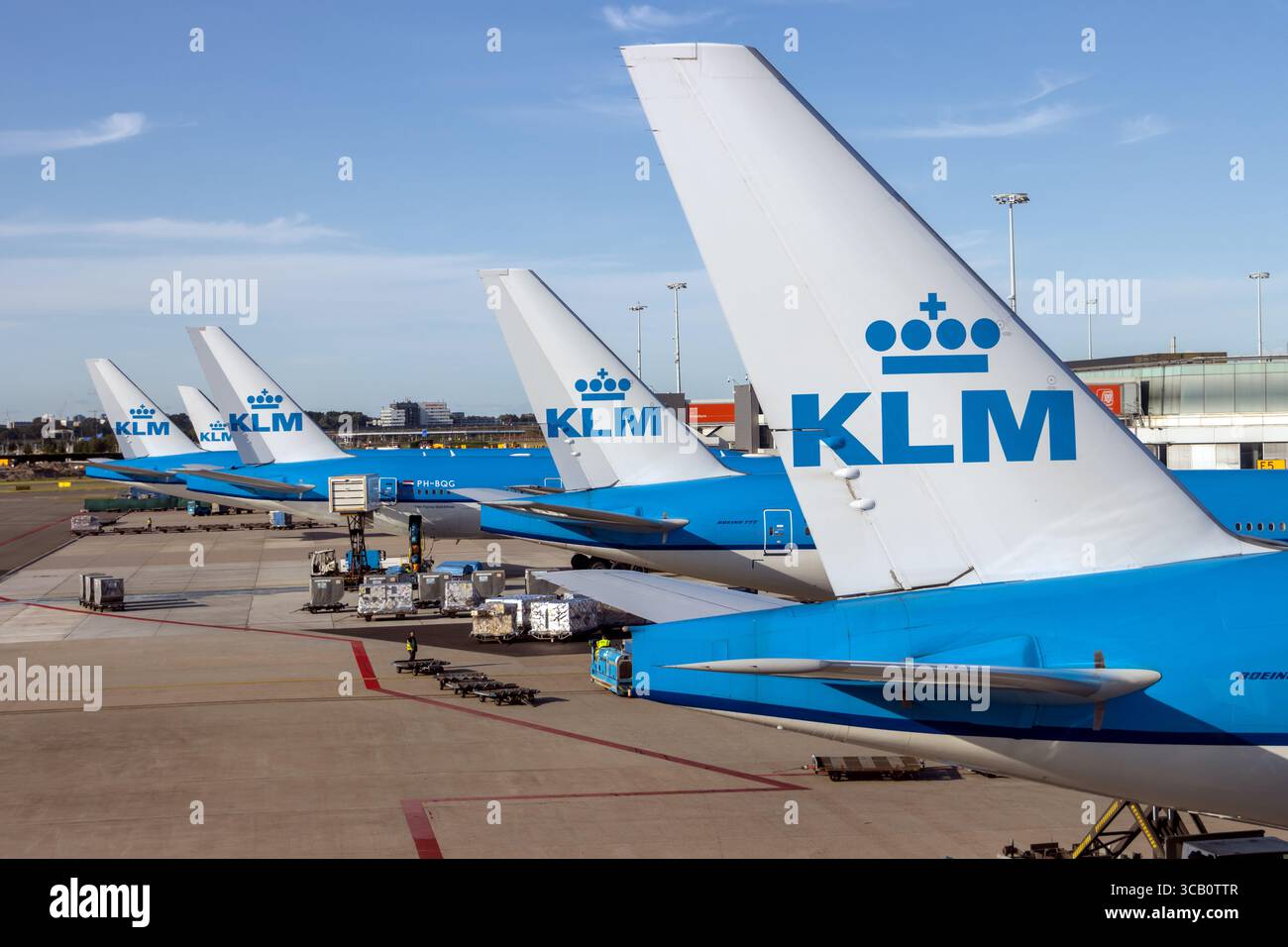 AMSTERDAM, NETHERLANDS, JULY 03 2025, Row of KLM aircraft parked at an ...