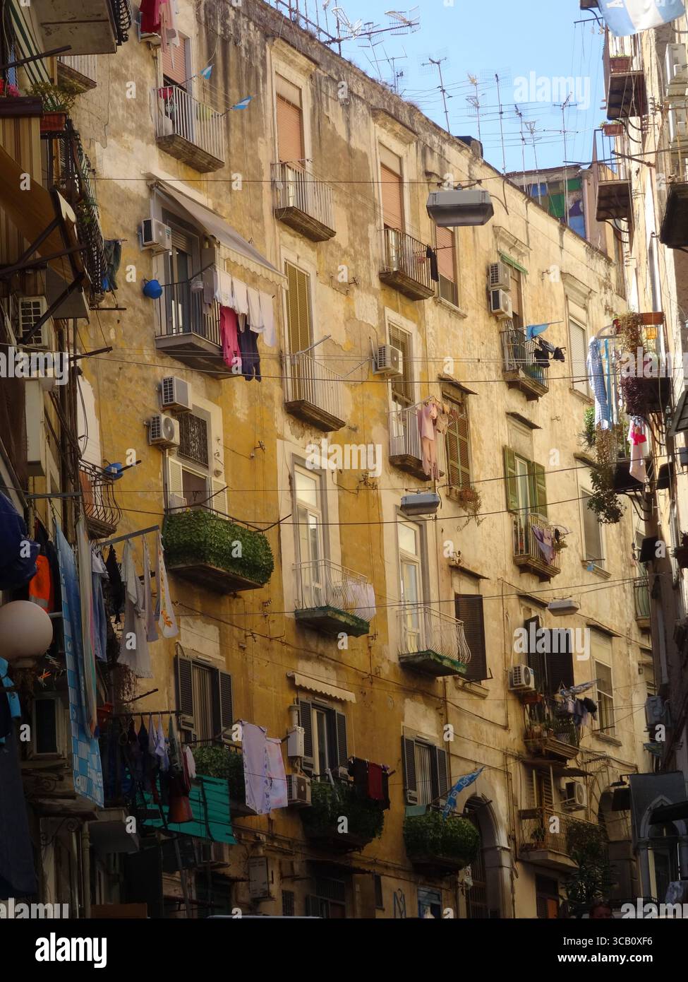 Homes on a street in Naples in Italy. Naples is the regional capital of ...
