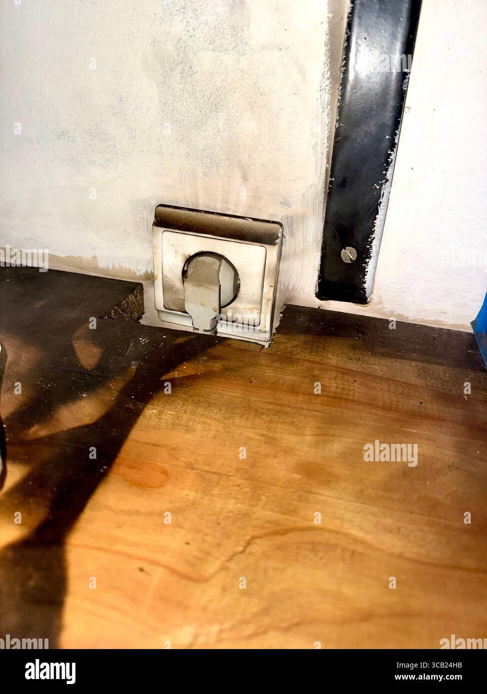 Burnt electrical socket showing signs of overheating and posing a ...