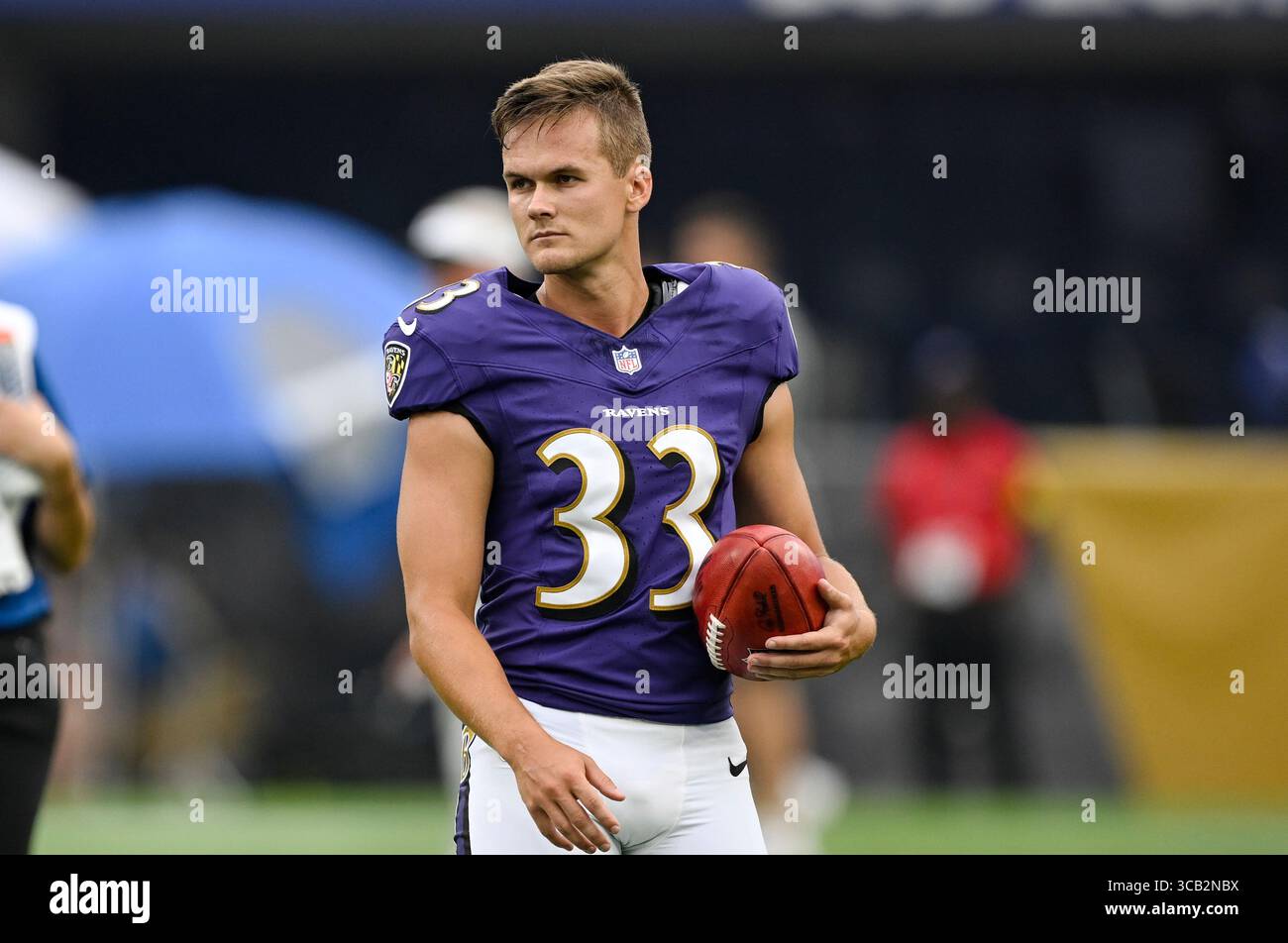 Baltimore Ravens place kicker Tyler Loop (33) looks on during pre-game warm-ups before an NFL ...