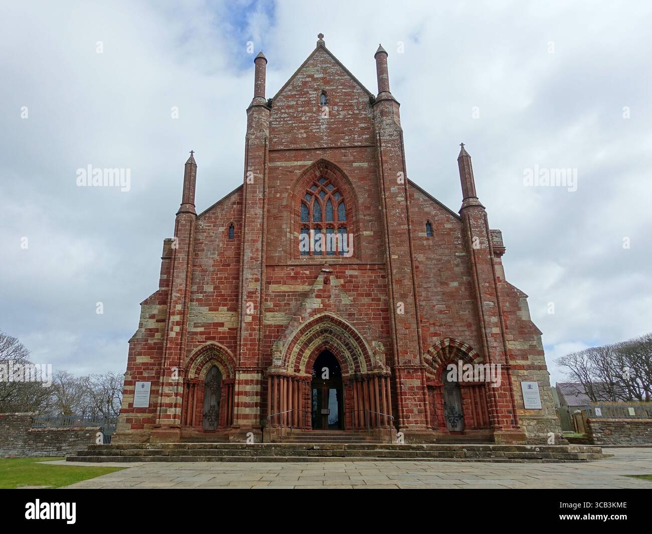 Main entrance of the ancient Saint Magnus' Cathedral, made of red and ...