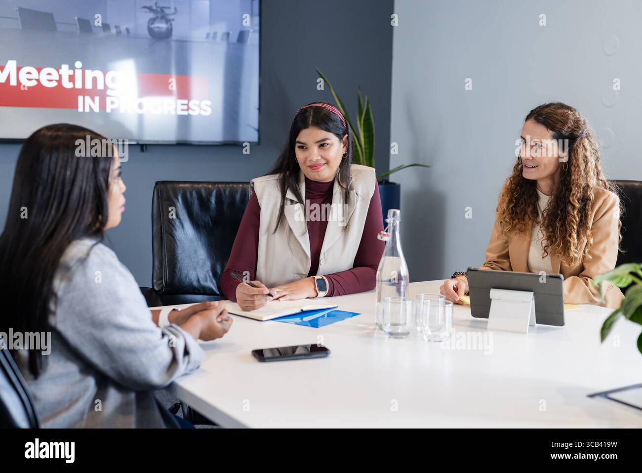 Diverse female coworkers wearing blazers hi-res stock photography and ...