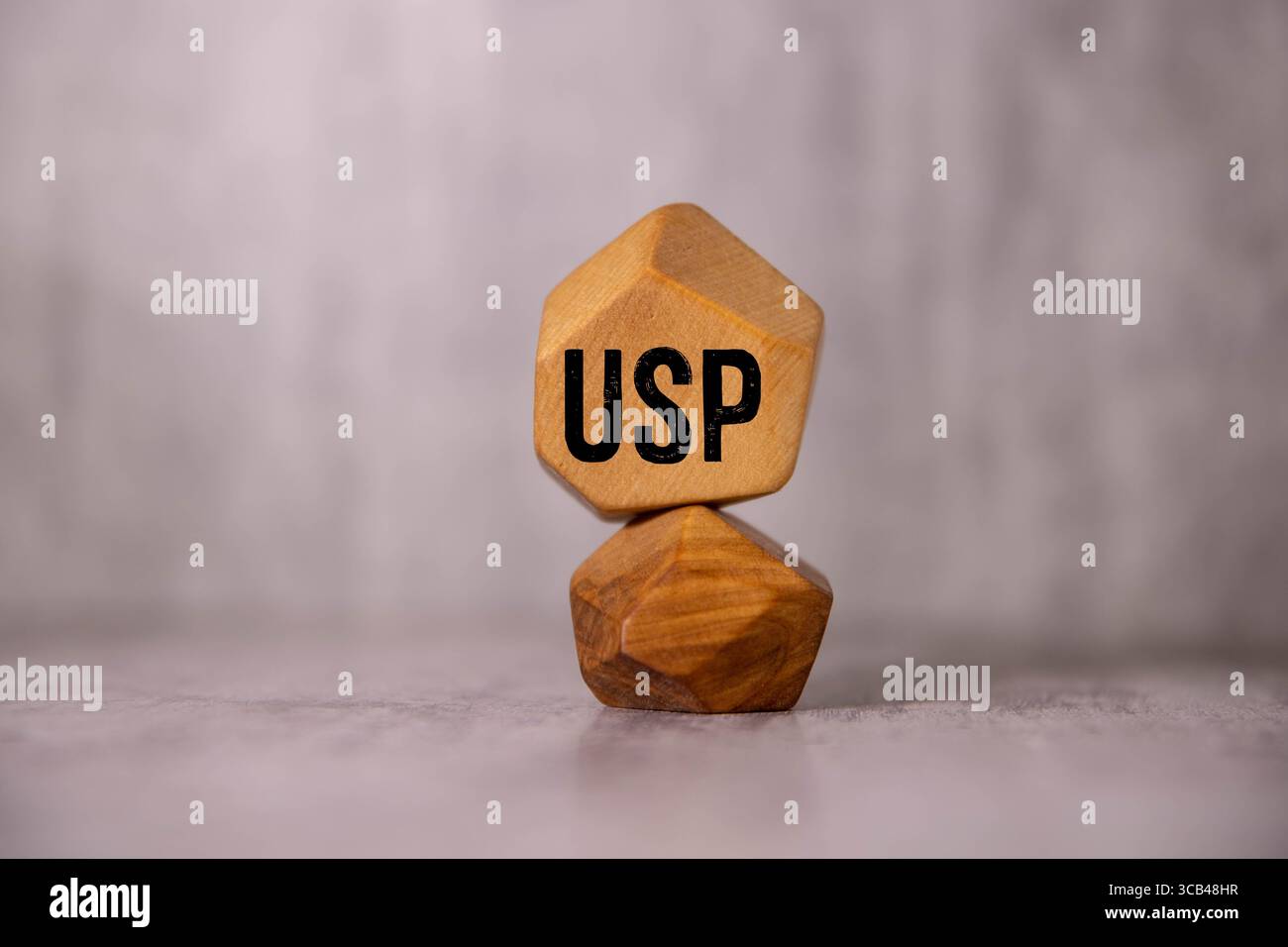 USP text on wooden blocks, financial business concept, blue background ...