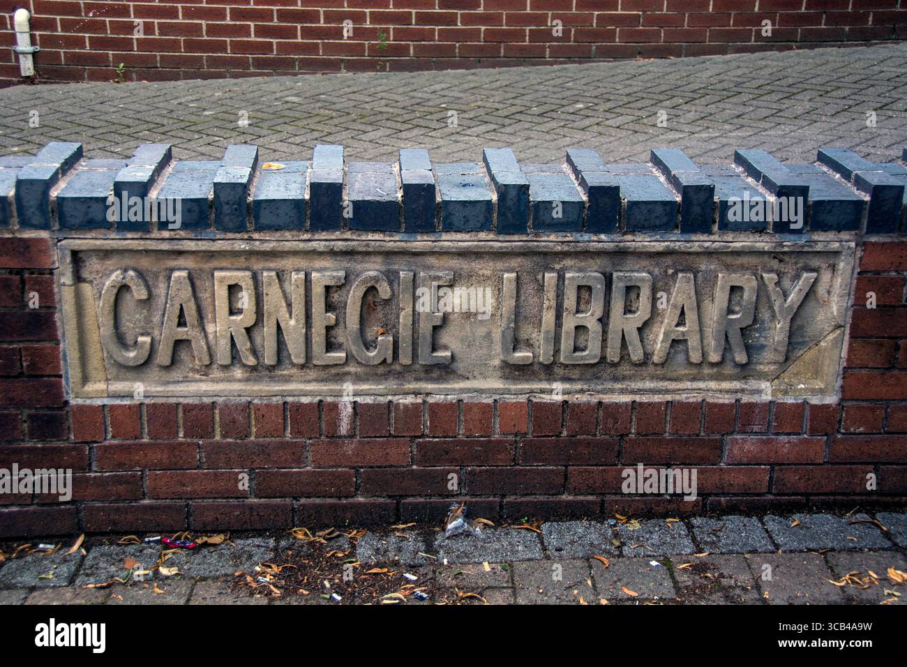 sign stone of former Carnegie Library which built by Scottish-American ...