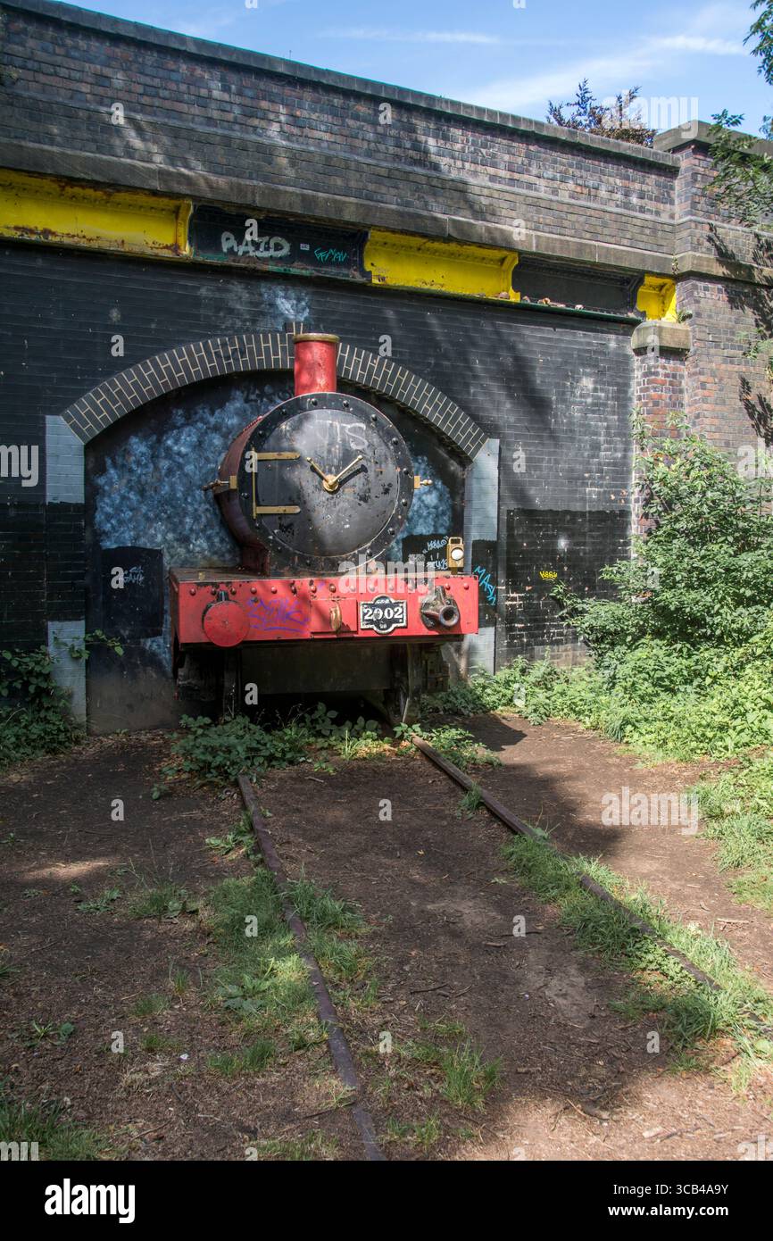 Little Red Train which is life sized red steam locomotive, appearing to ...