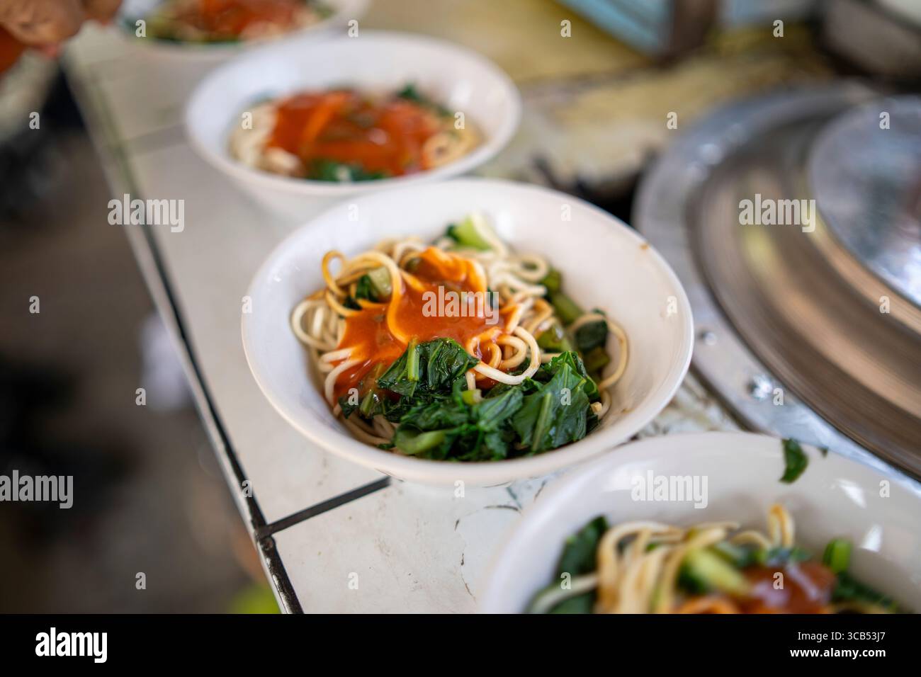 Indonesian Chicken Noodles Sold from Grobak Cart Stock Photo - Alamy