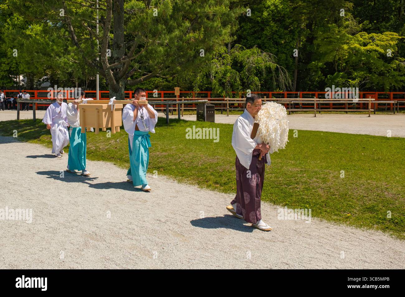 Shinto procession at Kamigamo Shrine with participants in traditional ...