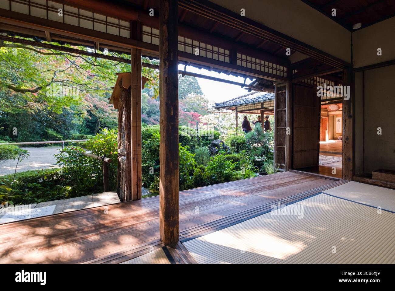 Traditional Japanese interior view featuring tatami flooring and wooden ...