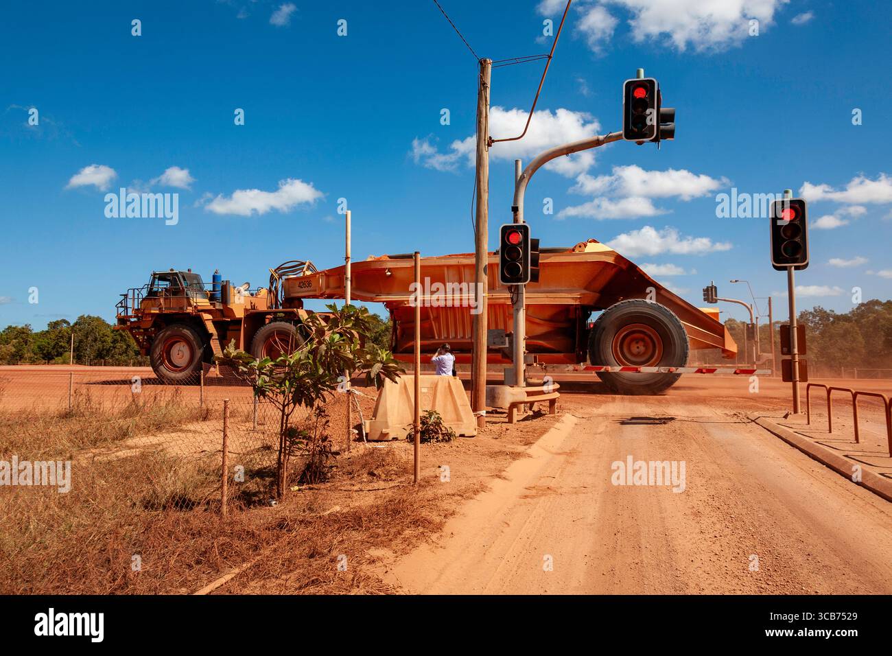 huge wheel iron ore mining truck passing traffic lights huge dump road ...