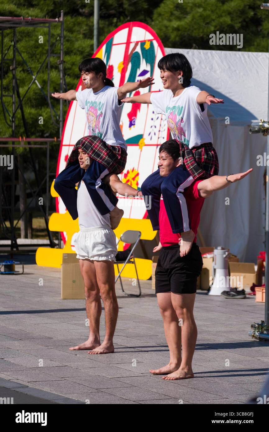 Kyoto University fall festival featuring performers demonstrating ...
