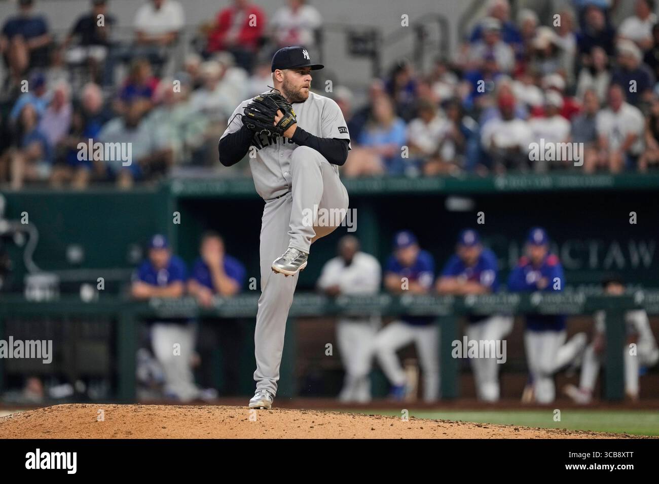 New York Yankees relief pitcher David Bednar winds up to deliver to the ...