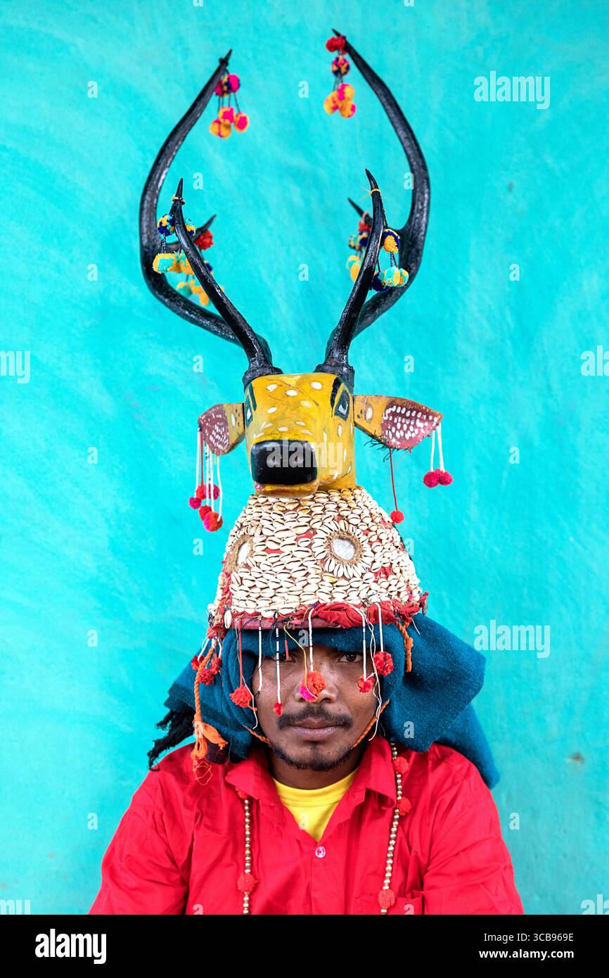 Man in skirt from deer horn muria tribe in traditional clothes with ...