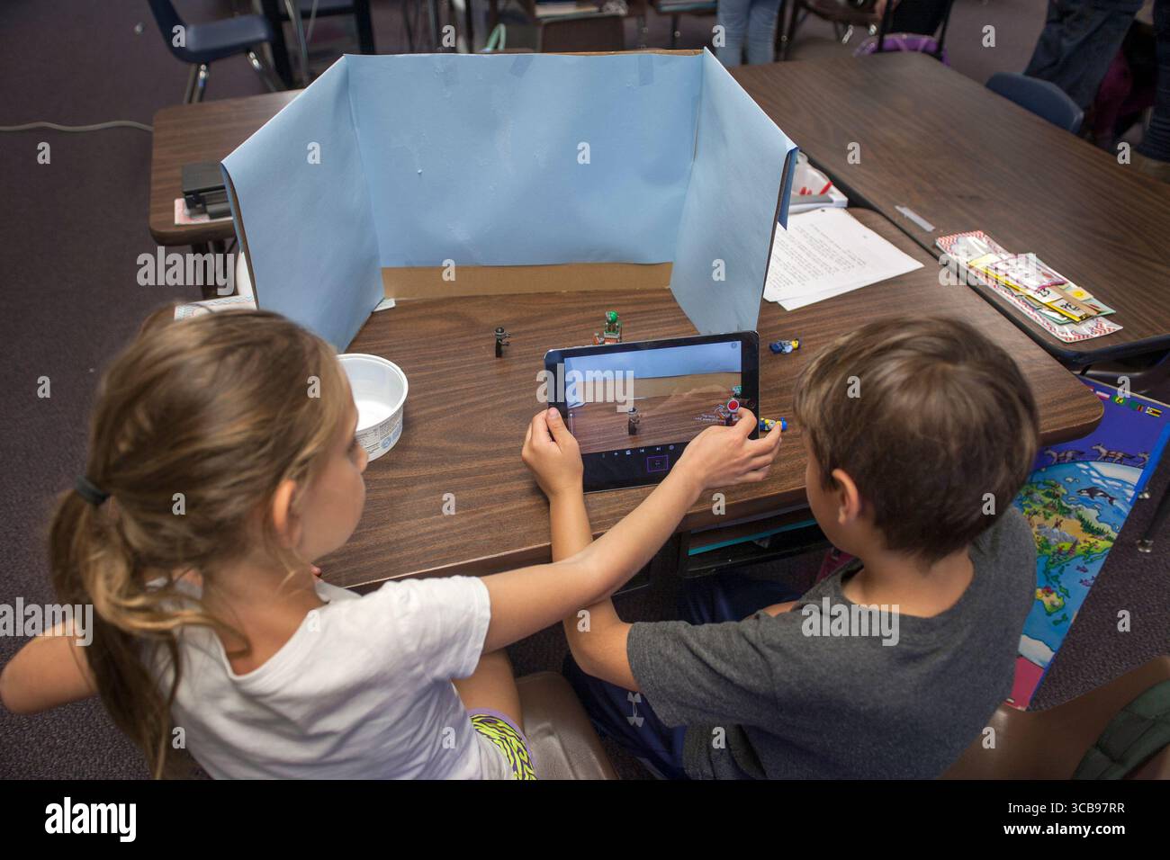 Students boys in school animation hi-res stock photography and images ...