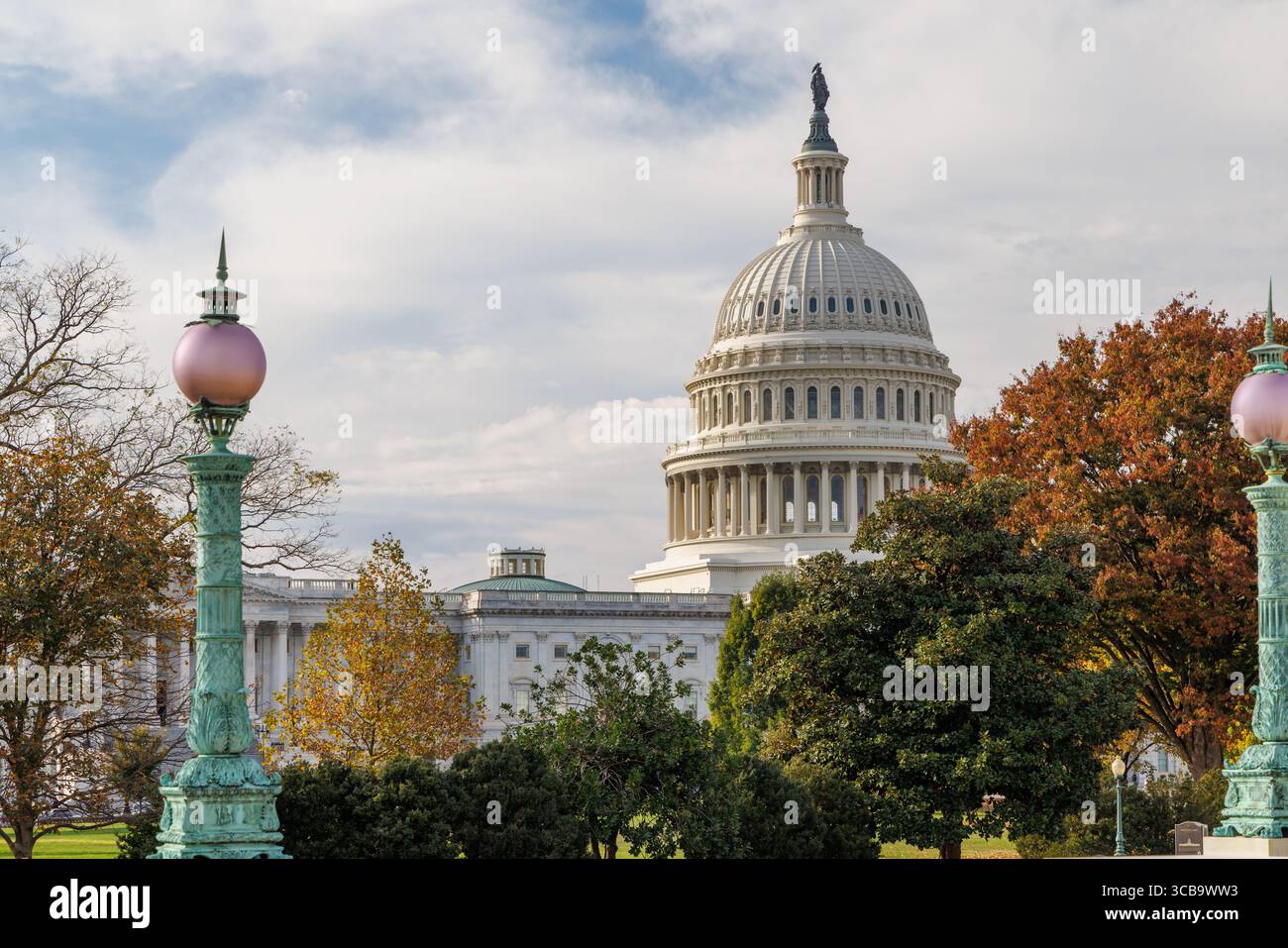The U.S. Capitol in Washington, D.C., surrounded by vibrant autumn ...