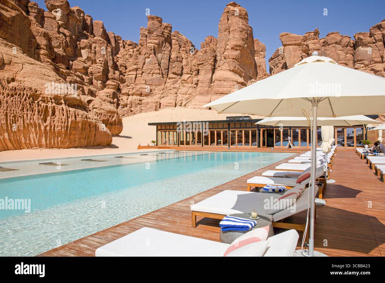 Saudi Arabia, Al Ula, Our Habitas AlUla hotel swimming pool, nestled in ...