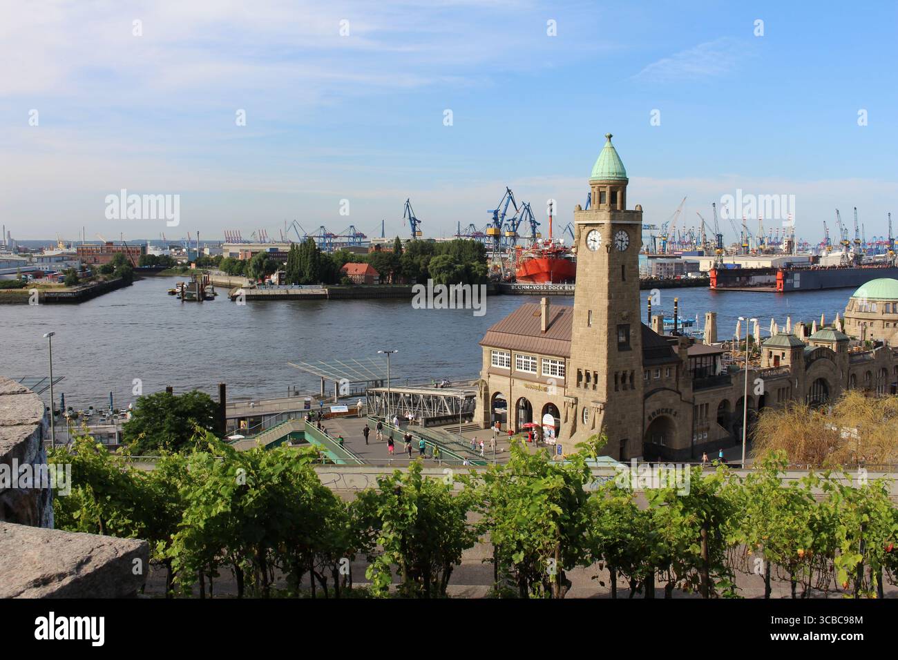 Aerial view of a church and harbor with ships, combining historic ...