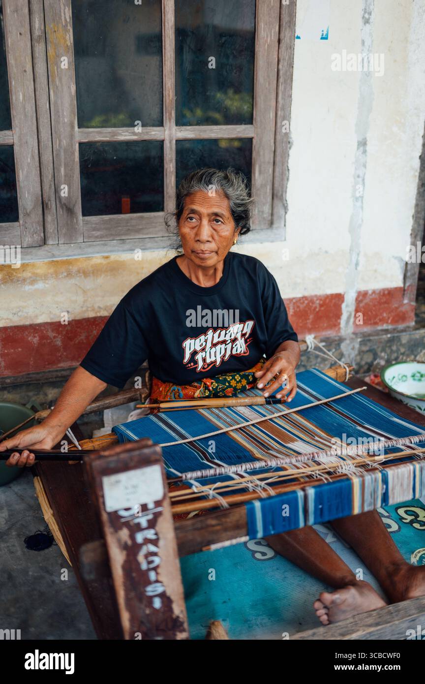 Traditional Weaver Creating Blue Textile by Hand in Tetebatu, Lombok ...