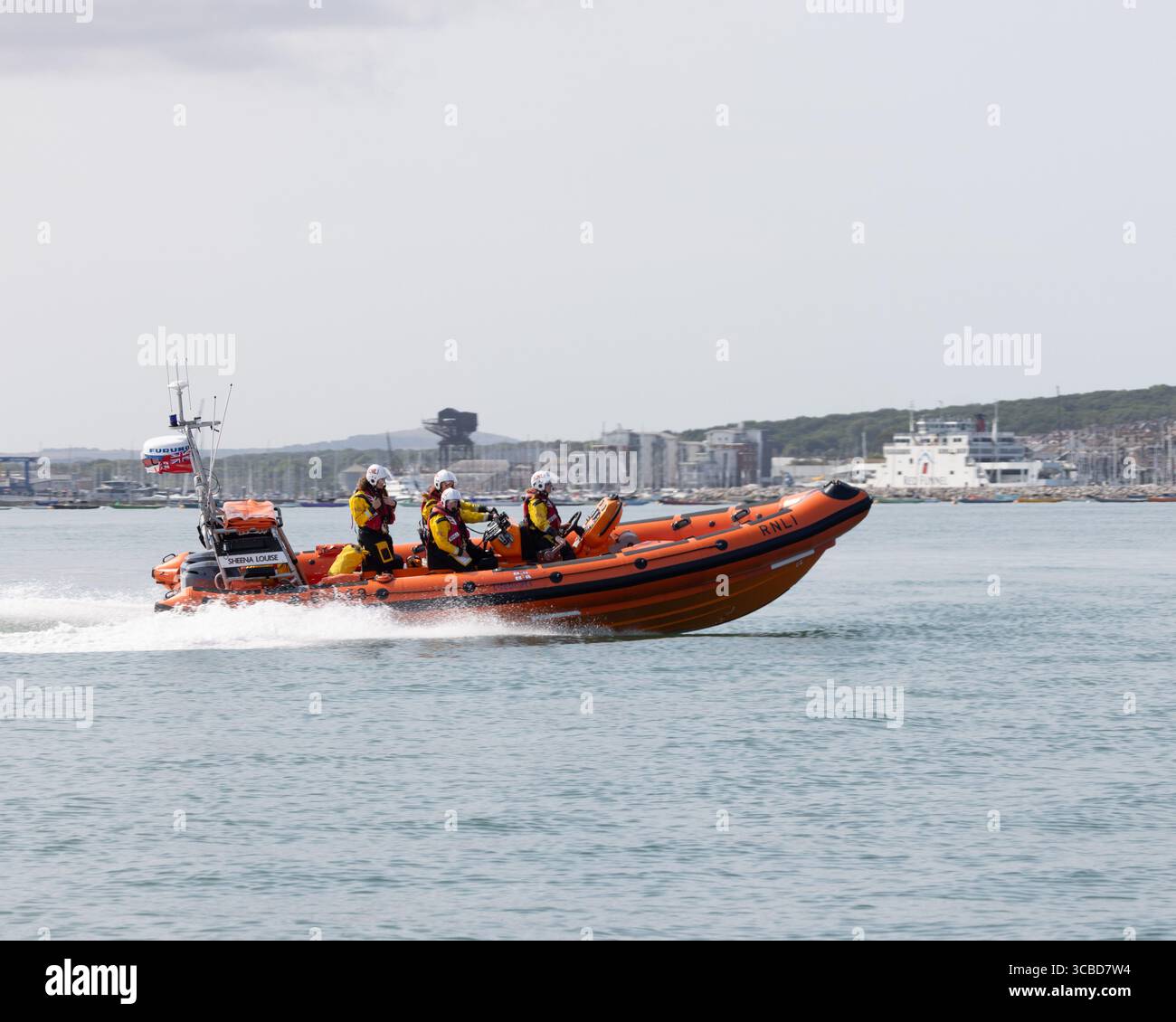 RNLI Atlantic 85 RIB lifeboat under power in the Solent Stock Photo - Alamy