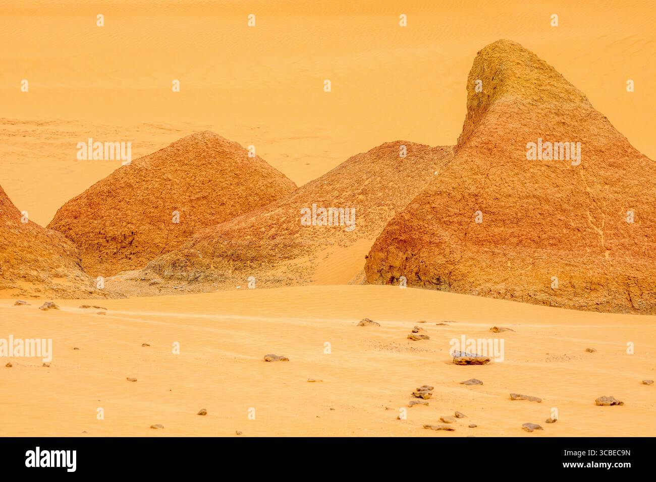 Cluster of Cone-Shaped Rocks in the Sahara Desert Stock Photo - Alamy