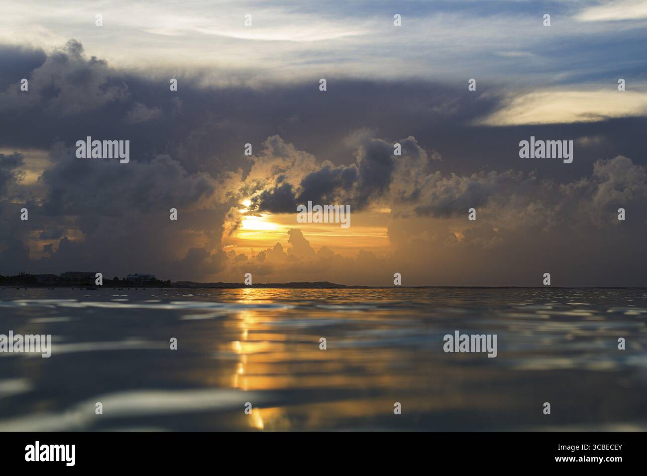 Sunset over ocean through hi-res stock photography and images - Alamy
