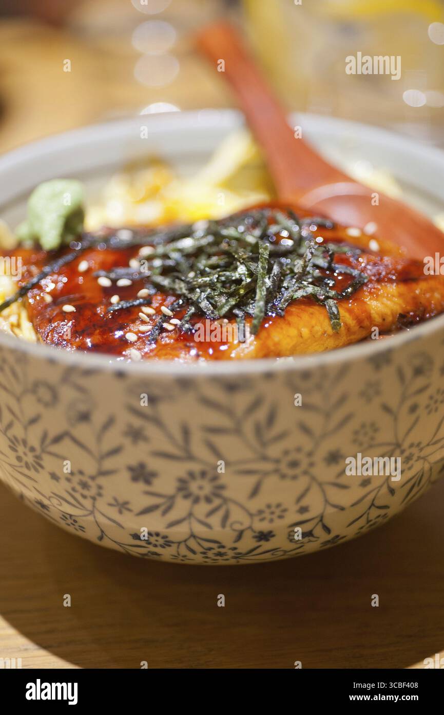 Traditional Japanese ramen noodles with unagi eel on top Stock Photo ...