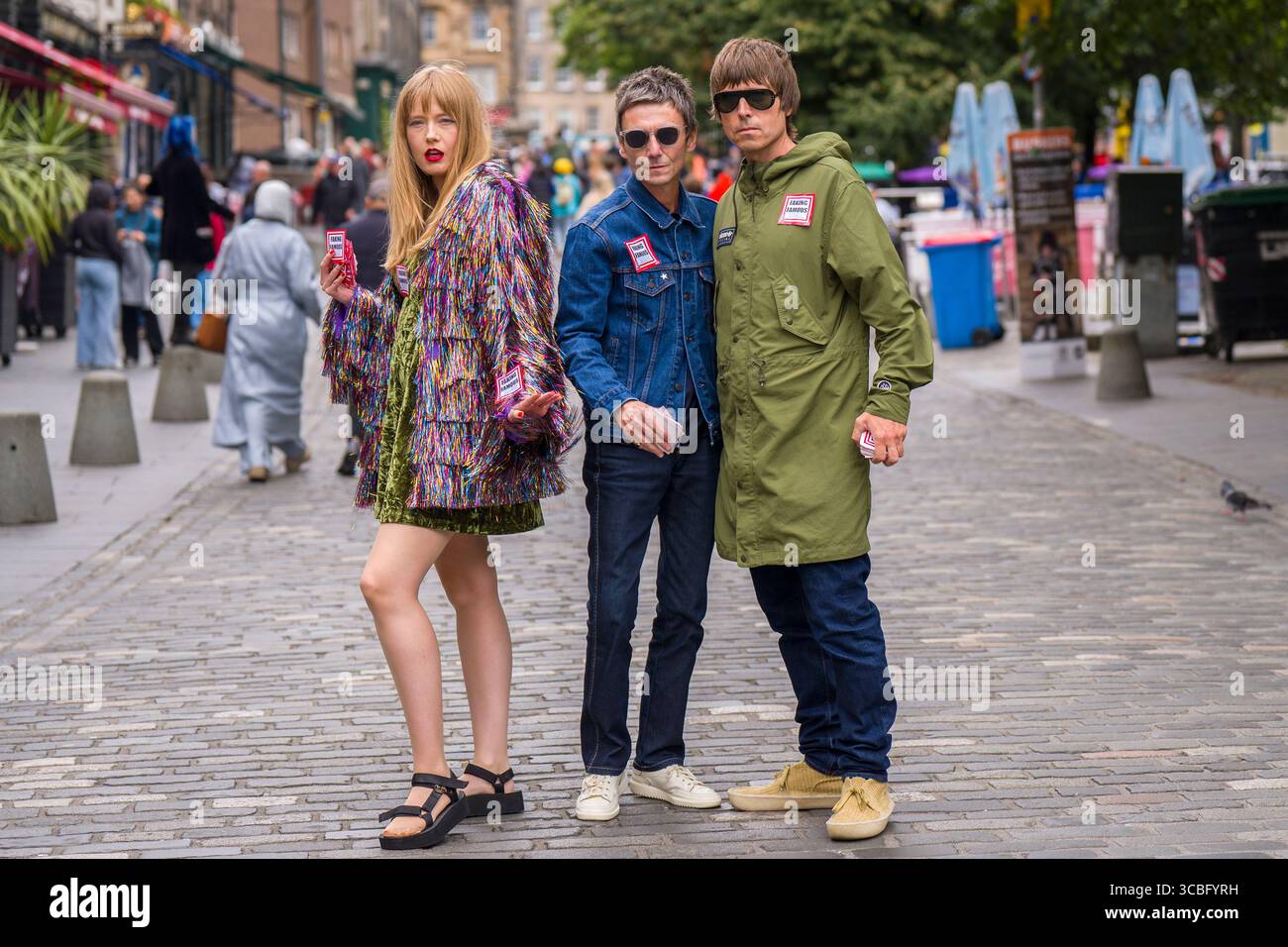 Lookalikes of Liam and Noel Gallagher and Taylor Swift get into character in The Grassmarket ...