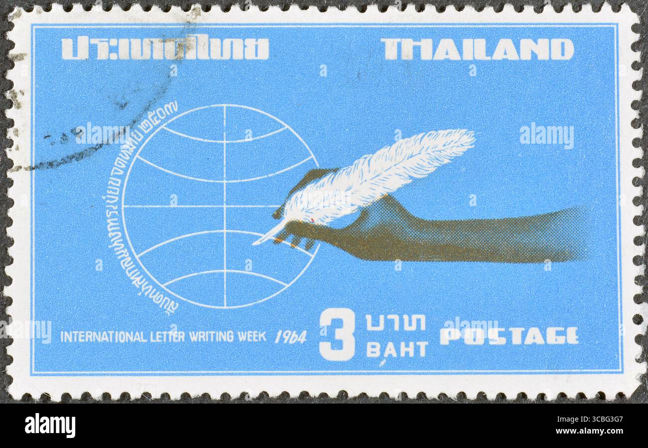 Postage stamp printed by Thailand, that shows Pigeon and globe ...