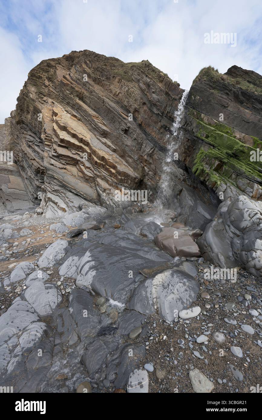 Waterfall and rocks on Sandymouth beachCornwall beach UK Stock Photo ...
