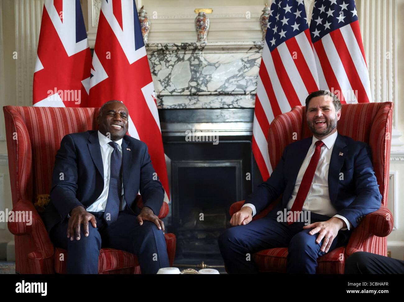 Britain's Foreign Secretary David Lammy, left, and US Vice President JD ...