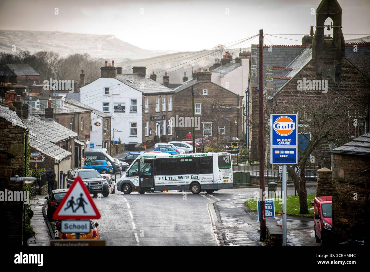 The Little White Bus making a turn into the Market Place at Hawes ...