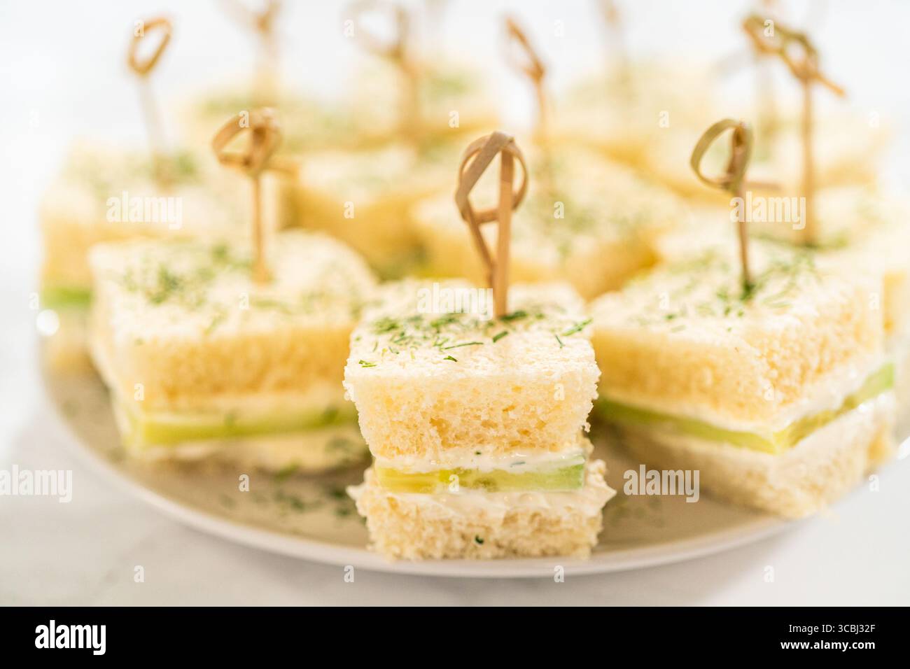 Mini Cucumber Sandwiches with Fresh Dill Stock Photo - Alamy