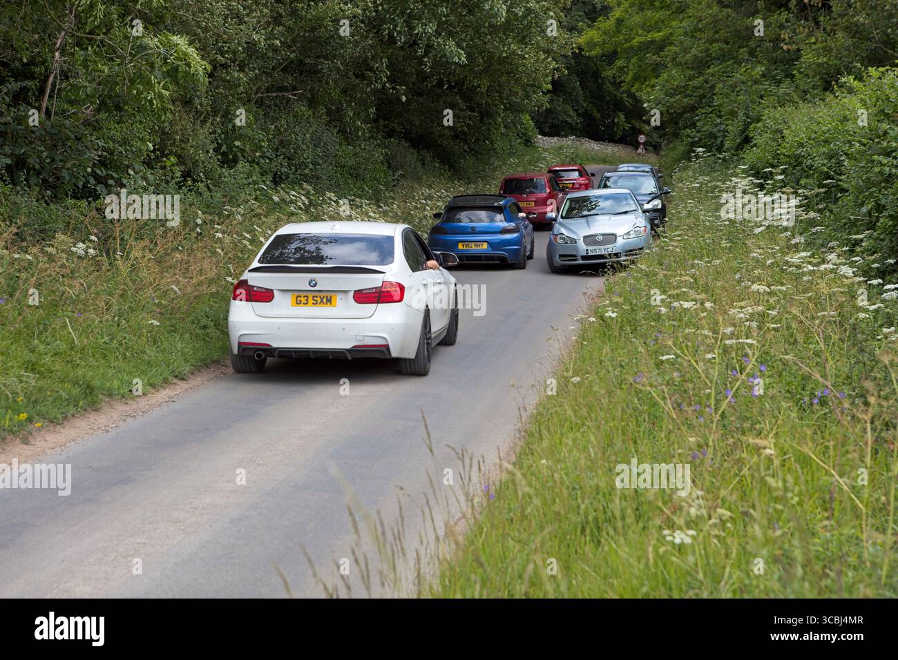 Rural traffic congestion. Visitors travelling to and from Jeremy ...