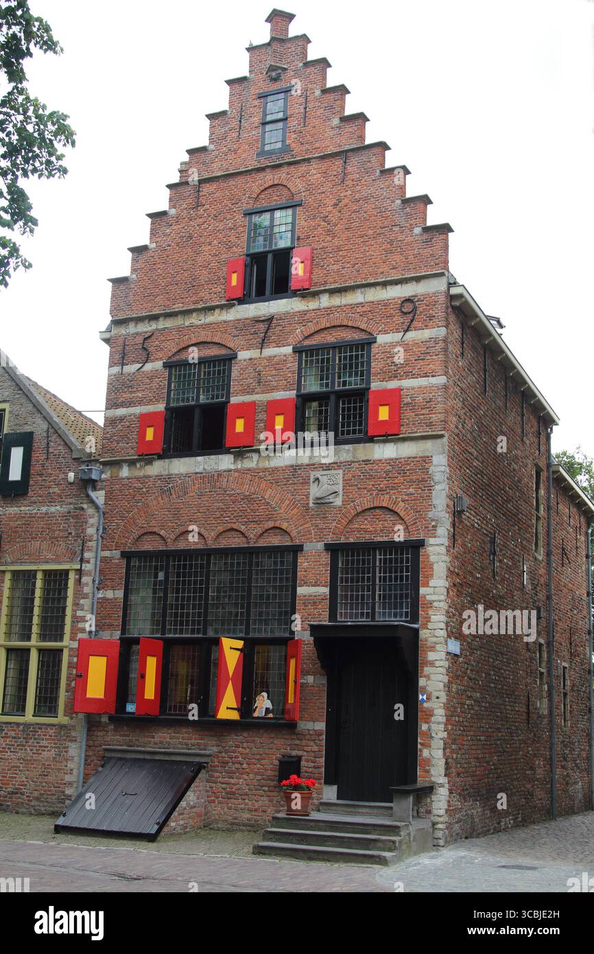 Beautiful old house with stepped gables, built of red brick stones ...