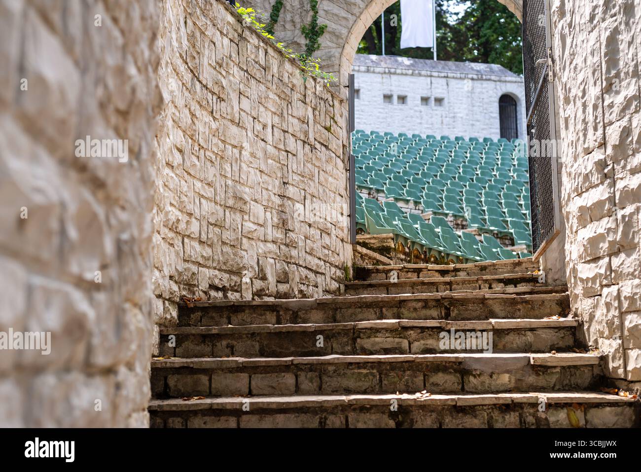Stone steps and gate leading to an open-air amphitheater Stock Photo ...