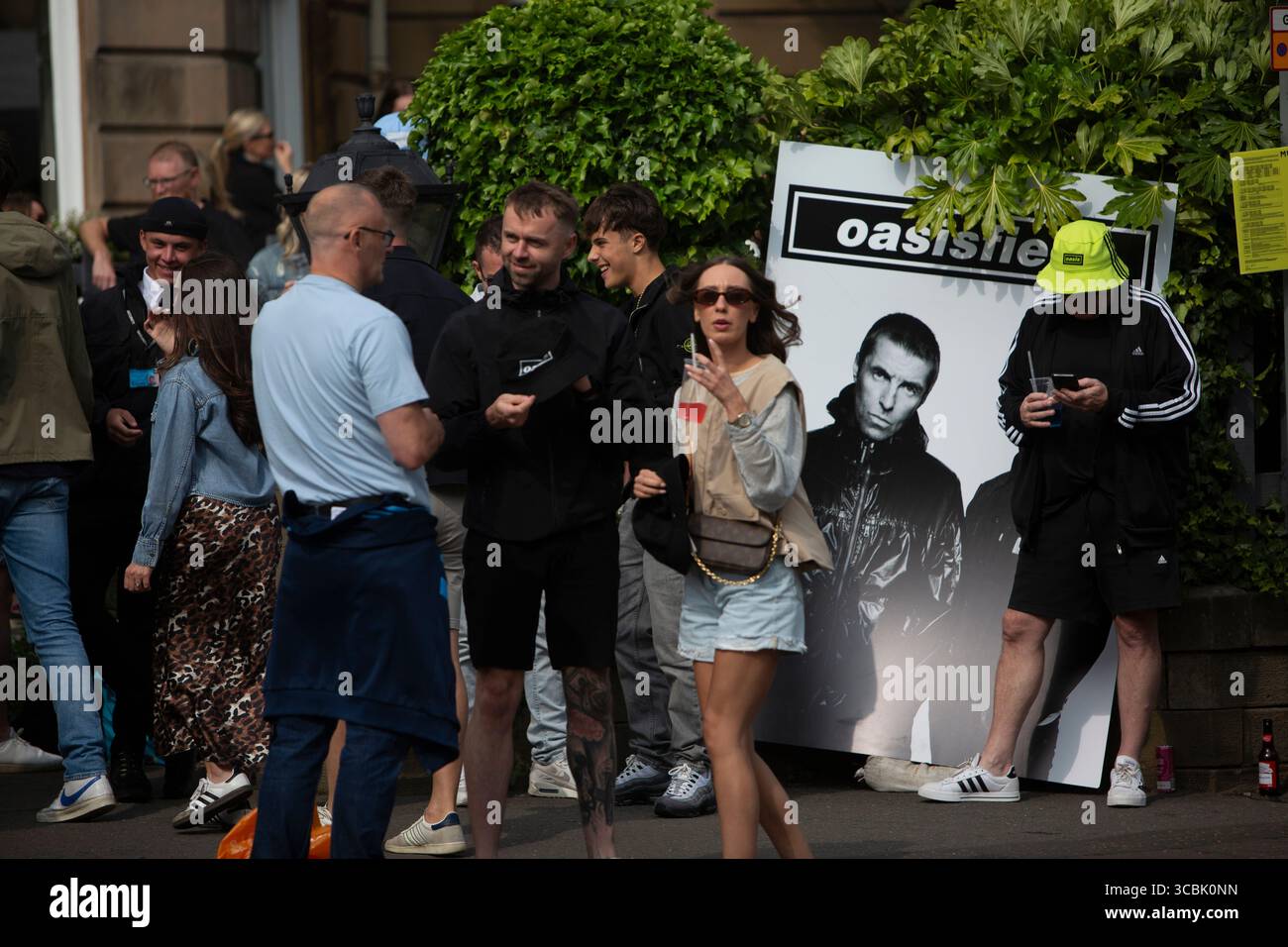 Edinburgh, Scotland. UK. 8 August 2025. Revelers gather outside of the Murrayfield Stadium of ...