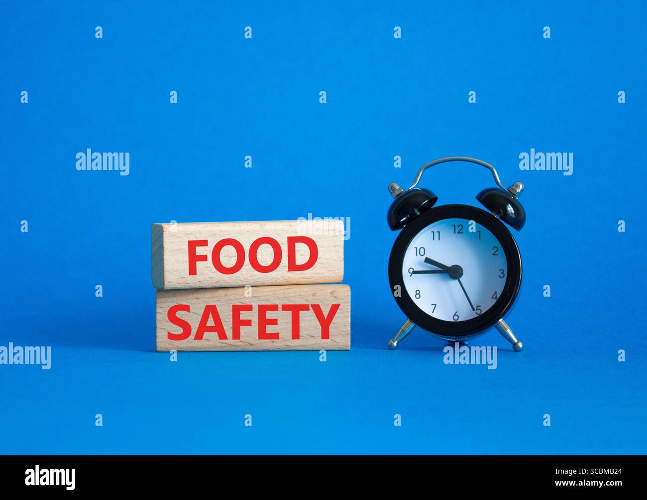 Food Safety symbol. Concept word Food Safety on wooden blocks ...