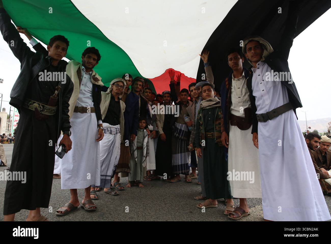YEMEN HOUTHIS USA ISRAEL CONFLICT Houthi supporters hold a large ...
