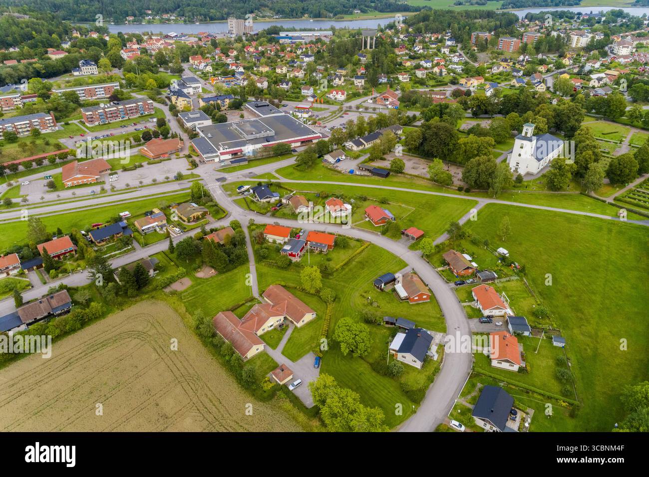 Aerial view of Gamleby's quaint rooftops and the serene waters, where ...