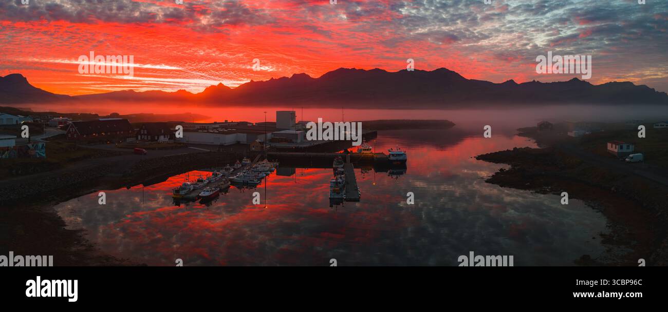 Aerial View of Icelandic Harbor at Sunset with Mountains and Mist Stock ...