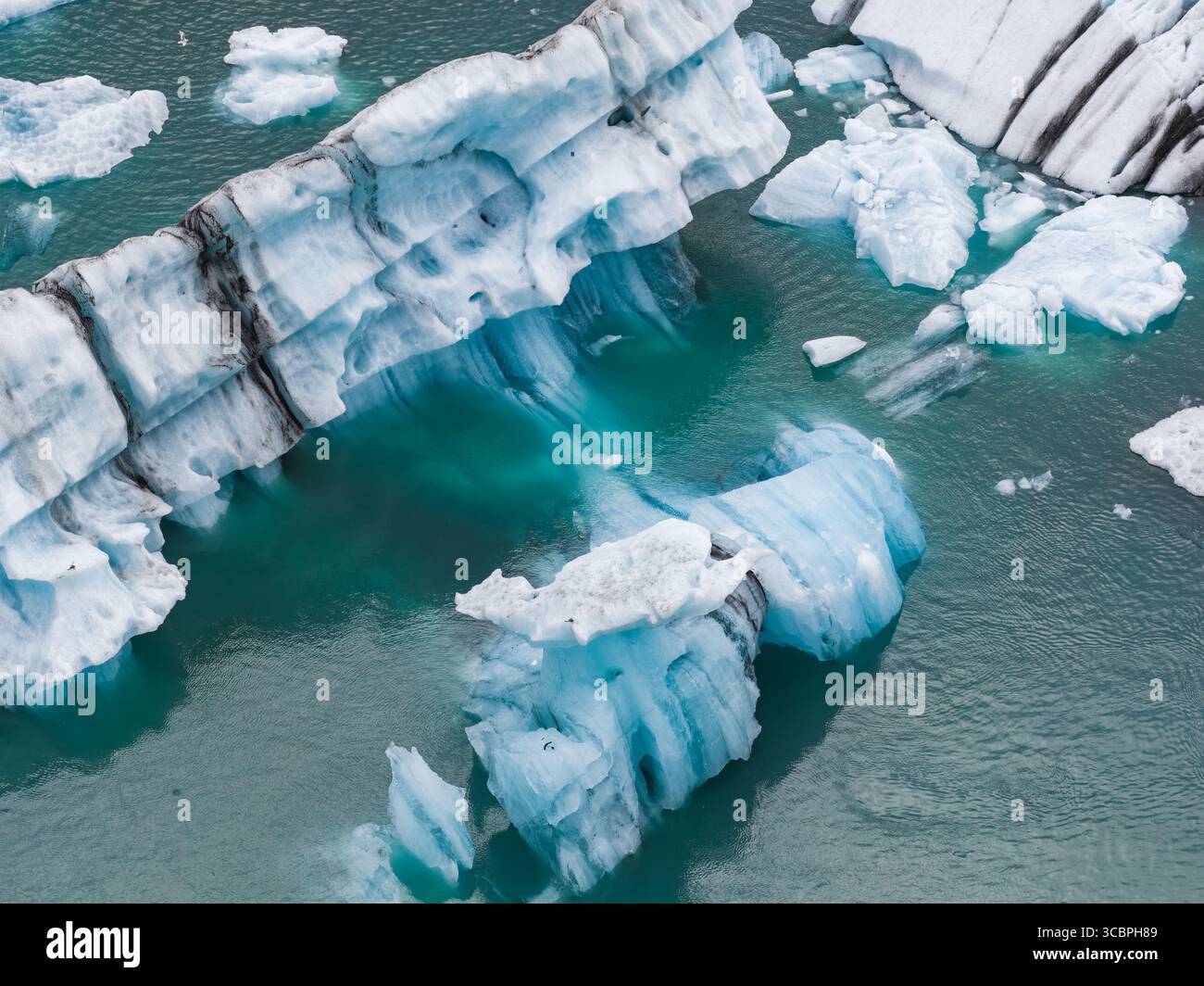 Aerial View of Icebergs in a Turquoise Glacial Lagoon in Iceland Stock ...