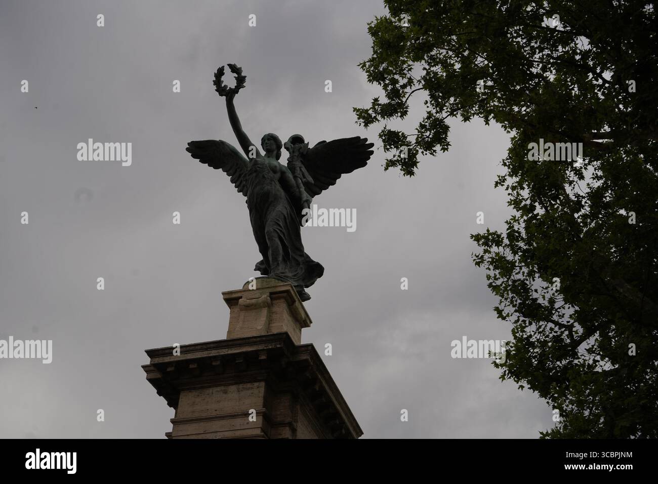 Rome, Italy, July 13th 2025. A low-angle shot of a statue of a winged ...